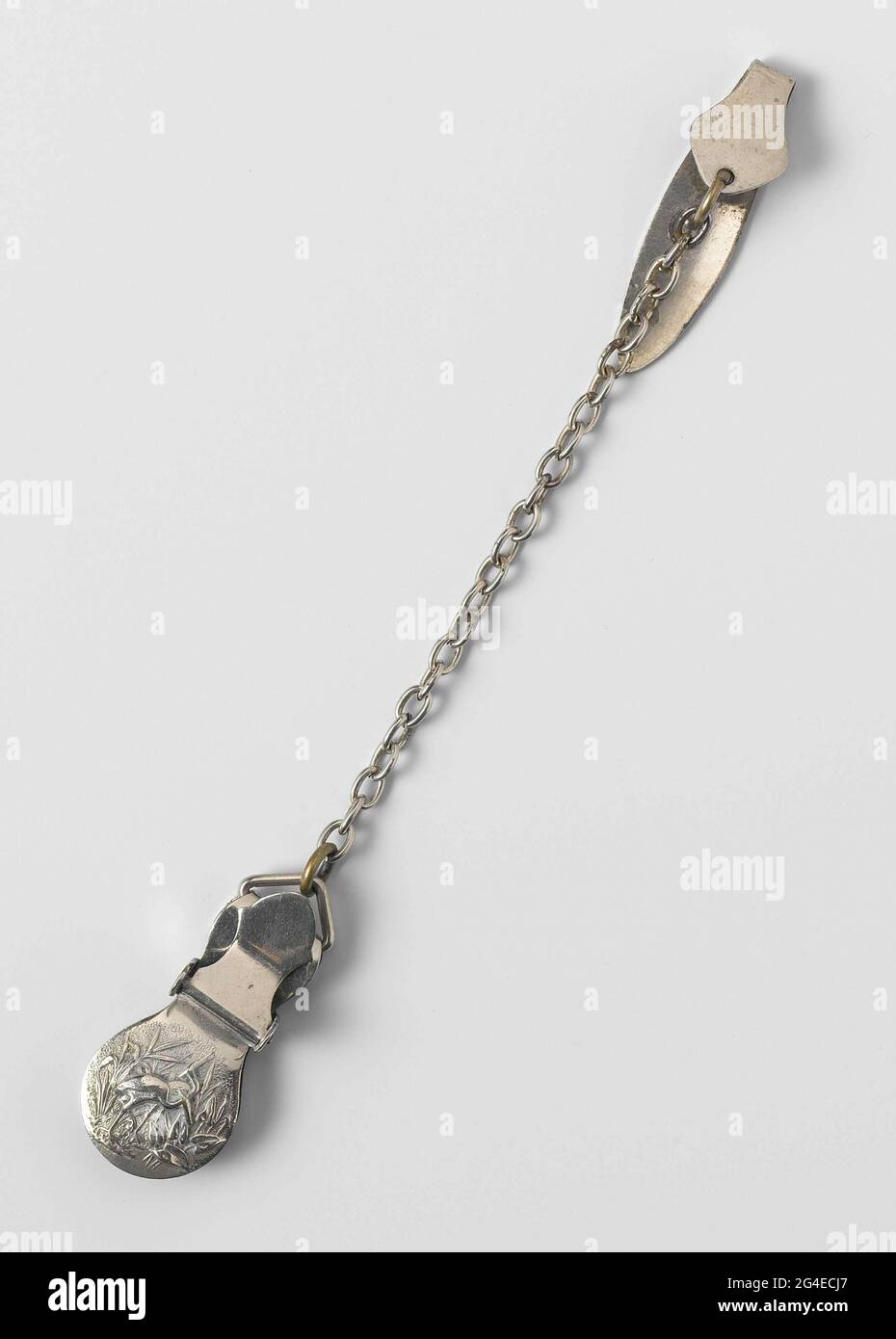 . Rokop holder of white metal with round clamp on which two herons on ...