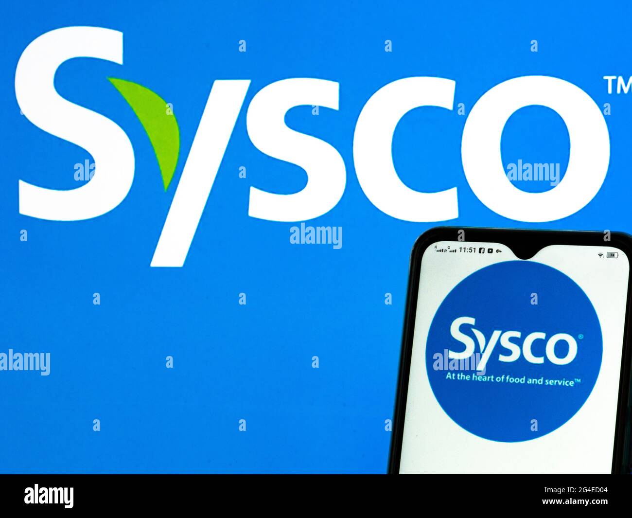 In this photo illustration, a Sysco Corporation logo seen displayed on ...
