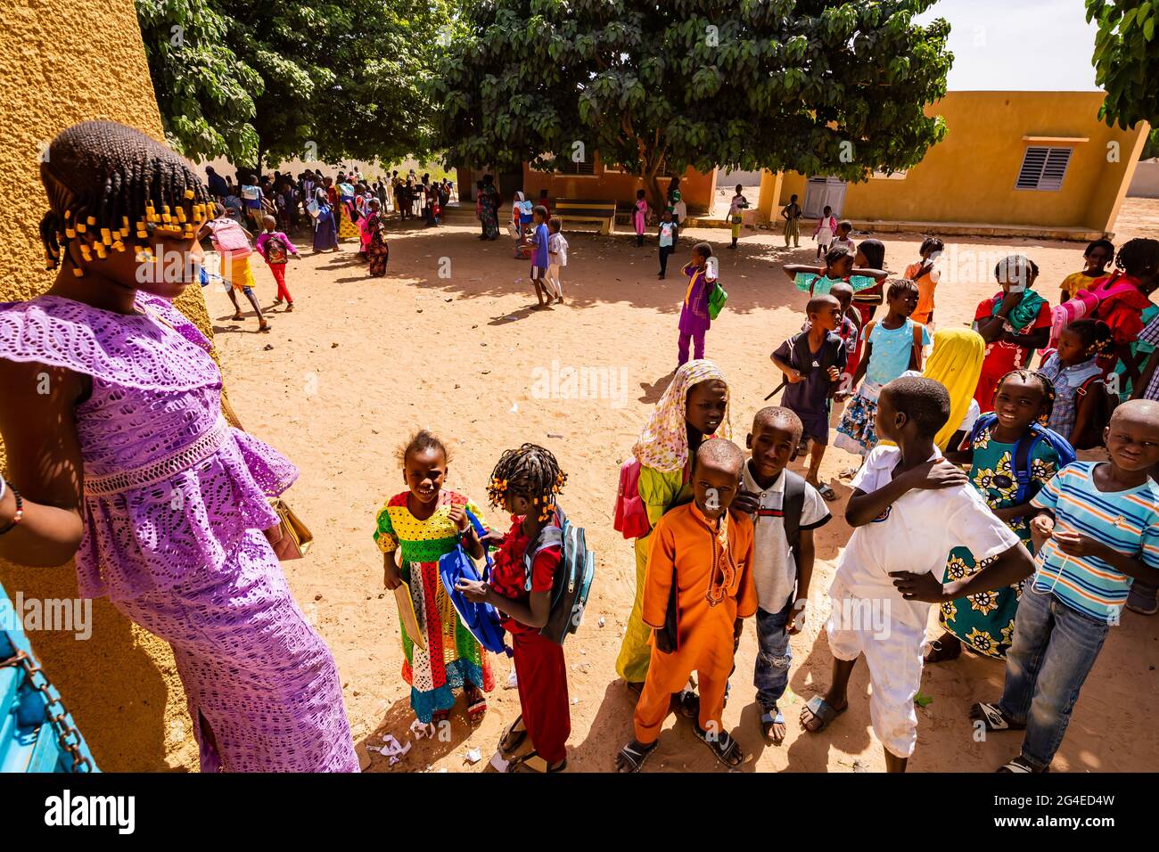 MBOUR, SENEGAL - DECEMBER Circa, 2020. Group of unidentified teenagers ...