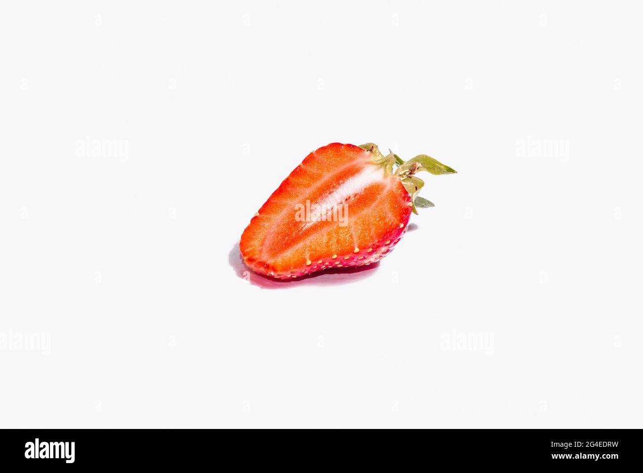 Fresh ripe half strawberry isolated on white background. Sweet summer ...
