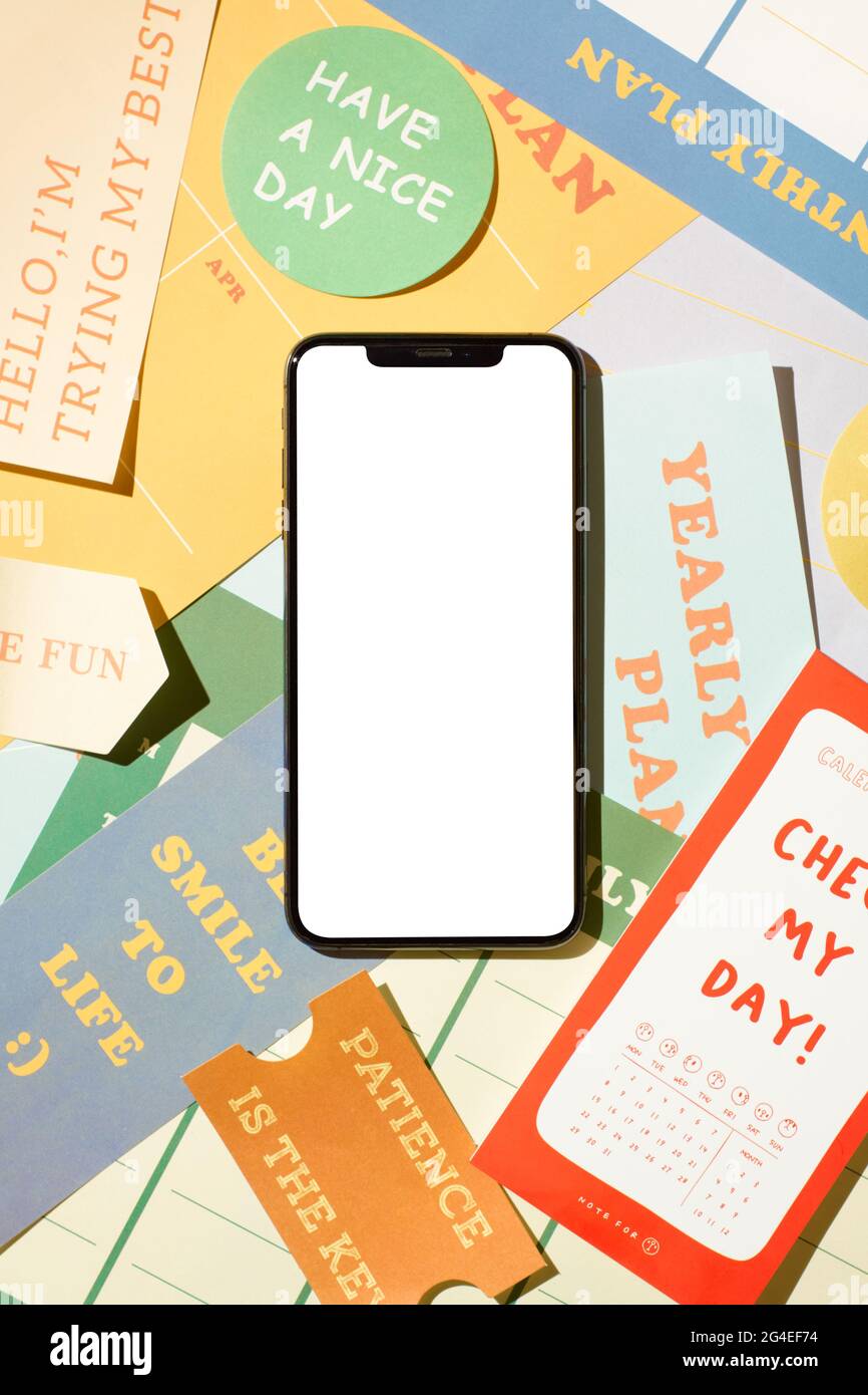 Iphone screen mockup lay on colorful motivative stickers Stock Photo ...