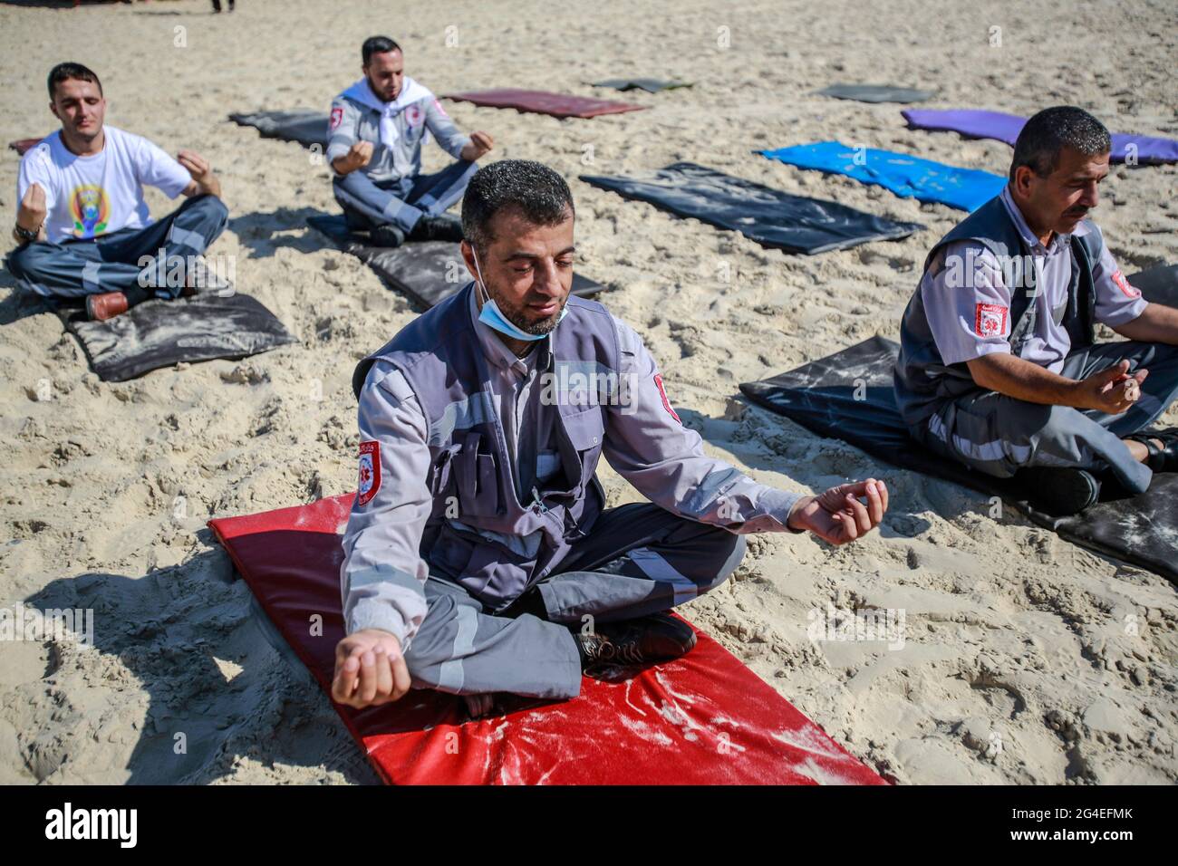 Gaza, Palestine. 21st June, 2021. Palestinian paramedics practice yoga ...