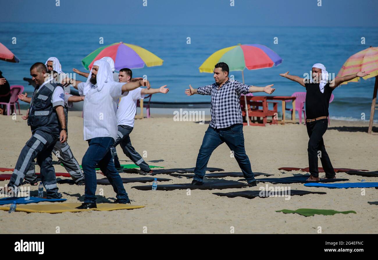Palestinian paramedics practice yoga on a beach during the ...