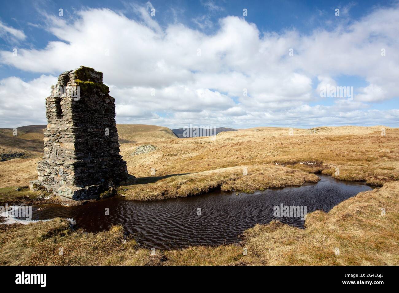 A survey tower on Tarn Crag in the Lake District used to survey a line ...