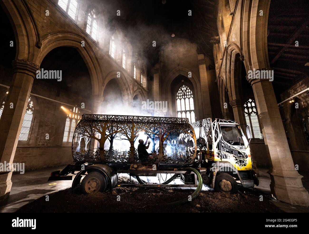 Curator Dominic Mason interacts with art installation "Future Returns ...
