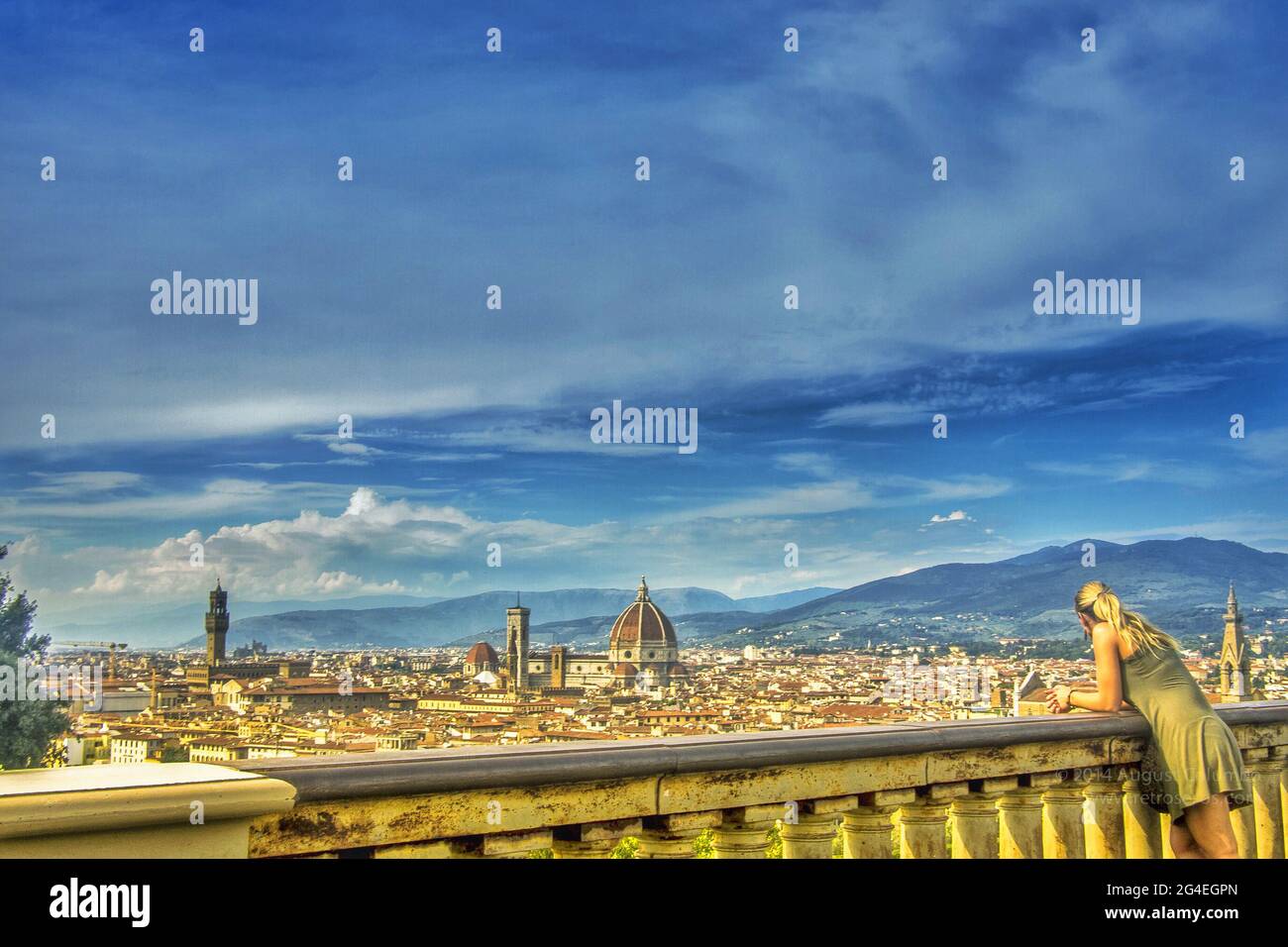 a beautiful view of florence, italy from a railing under the thin ...