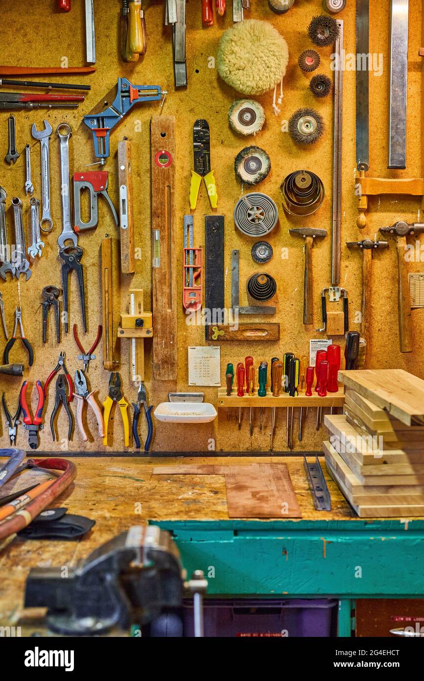 handyman tools hanging in a garden shed Stock Photo - Alamy
