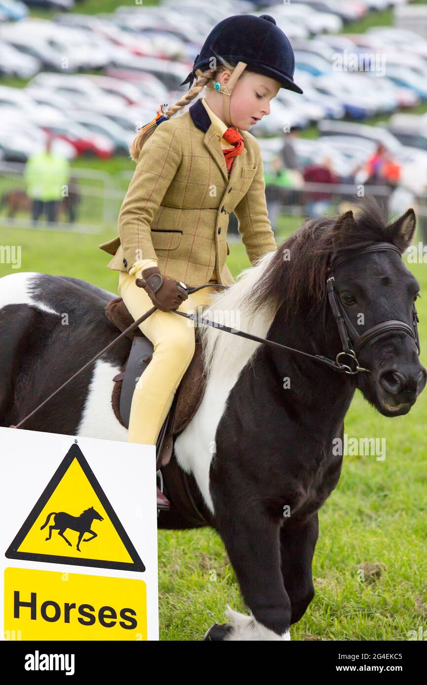 Children horse riding hi-res stock photography and images - Alamy
