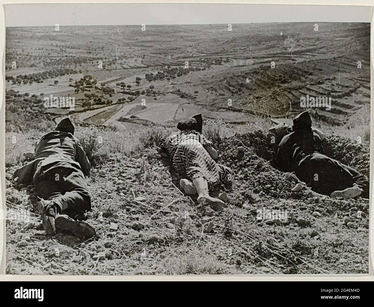 . A female shooter takes position between two republican soldiers at ...