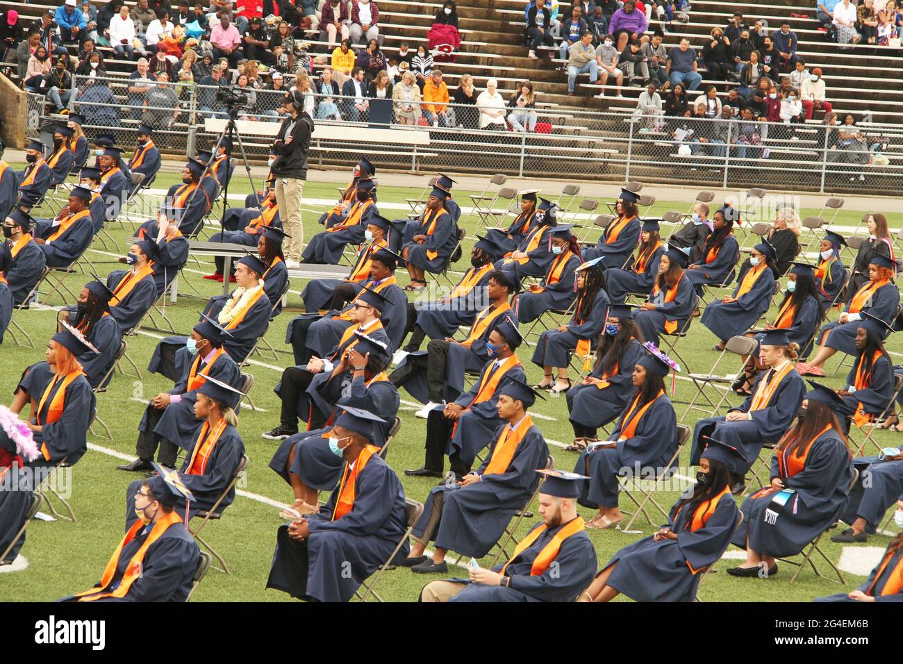 May 2020, U.S.A. A high-school graduation ceremony on a stadium towards ...