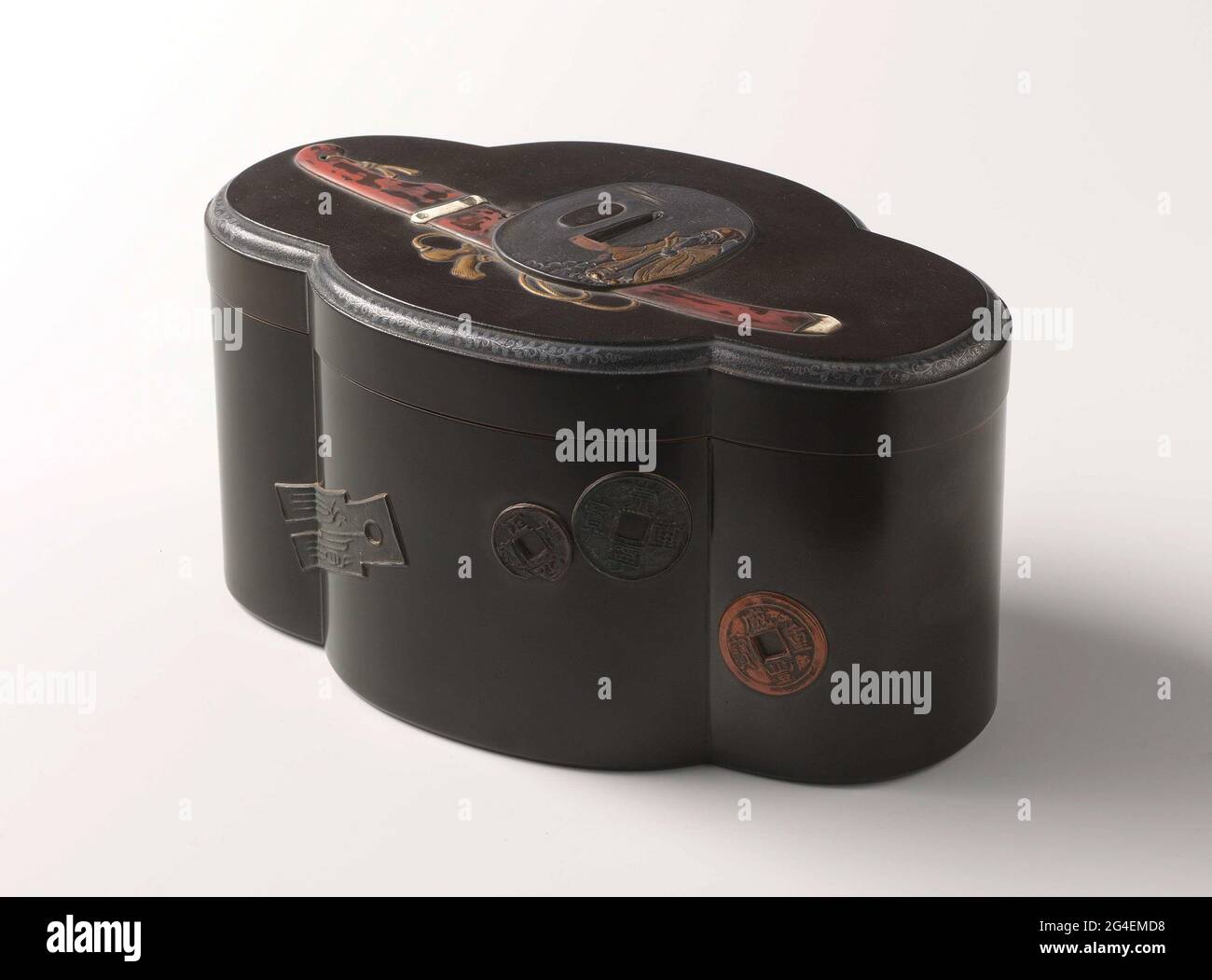 . High paint box with a representation of Chinese coins, Tsuba and a ...