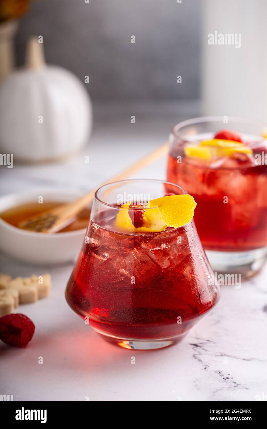 Raspberry lemon cocktail in a rocks glass Stock Photo - Alamy