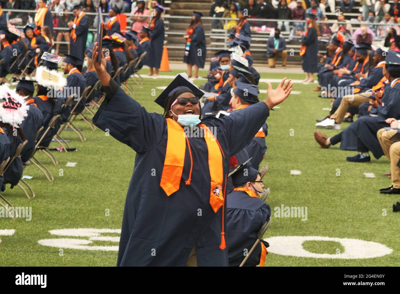 Happy high-school graduate in the U.S.A. during the COVID pandemic ...