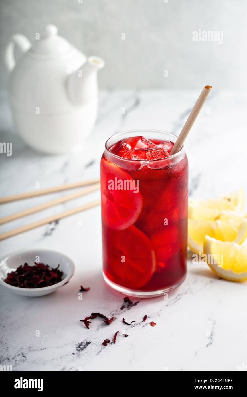 Lemon hibiscus tea served cold with ice Stock Photo - Alamy