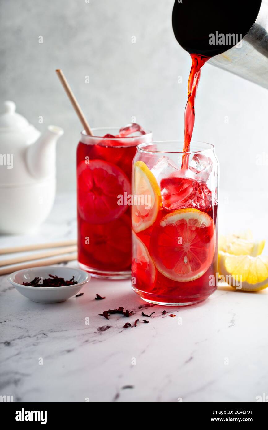 Lemon hibiscus tea served cold with ice Stock Photo - Alamy