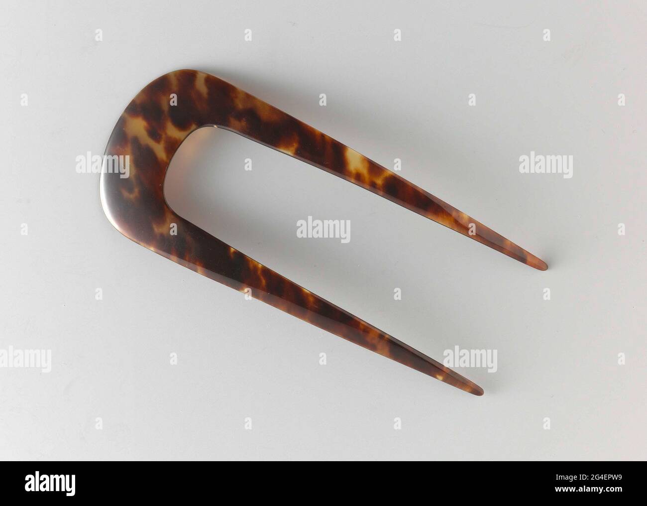 . Hair comb of imitation turtle, U-shaped with smooth, rounded back ...