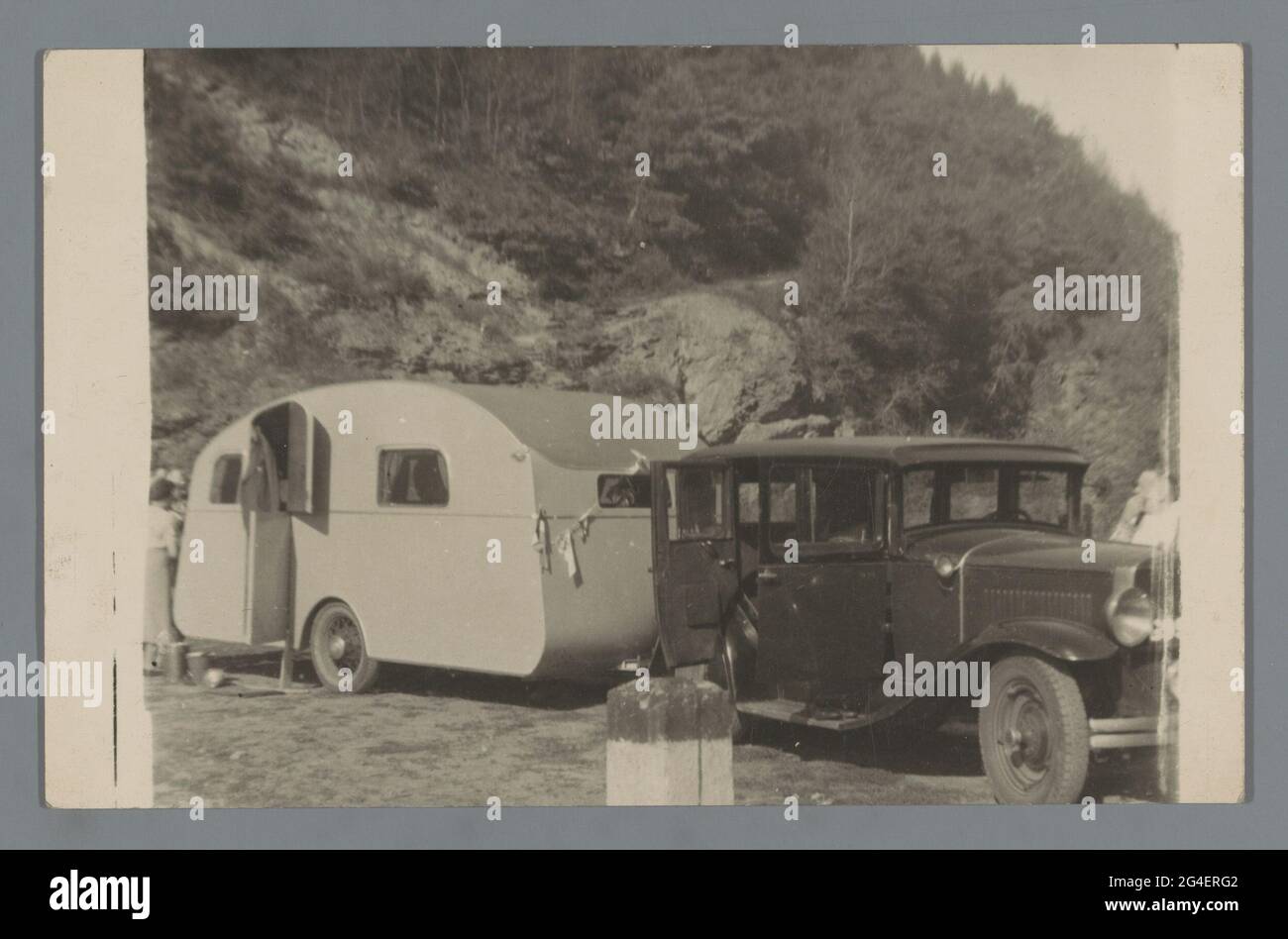 Car with a caravan Stock Photo - Alamy