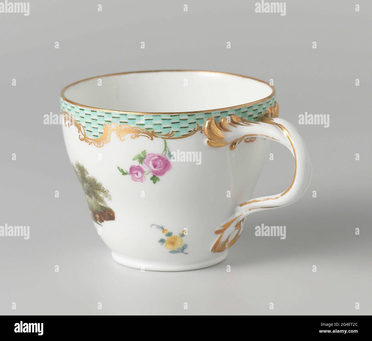 . High cup with ear, painted porcelain. The head is painted with ...