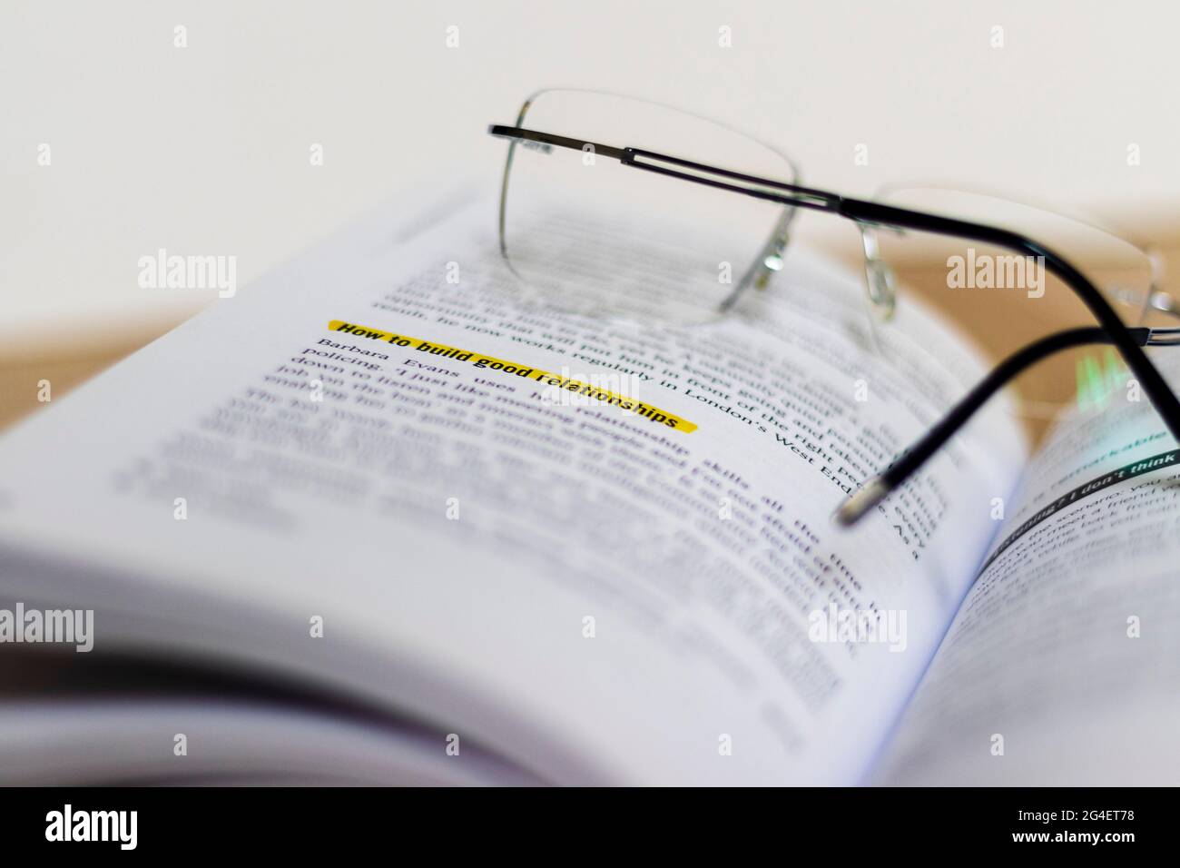 Open book with highlighted quote how to build good relationships Stock ...