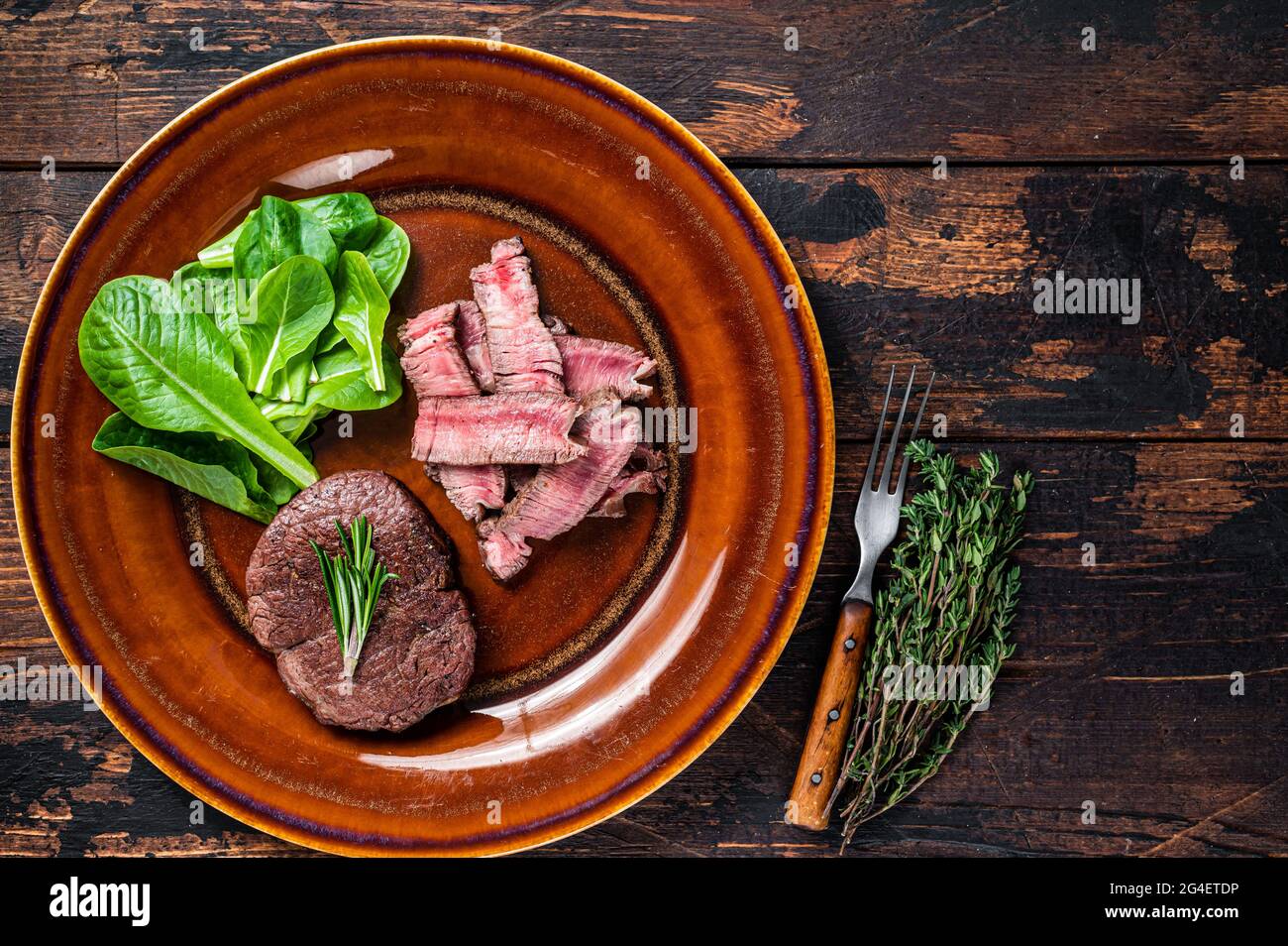 Fillet Mignon tenderloin roast and cut meat beef steaks in a plate with ...