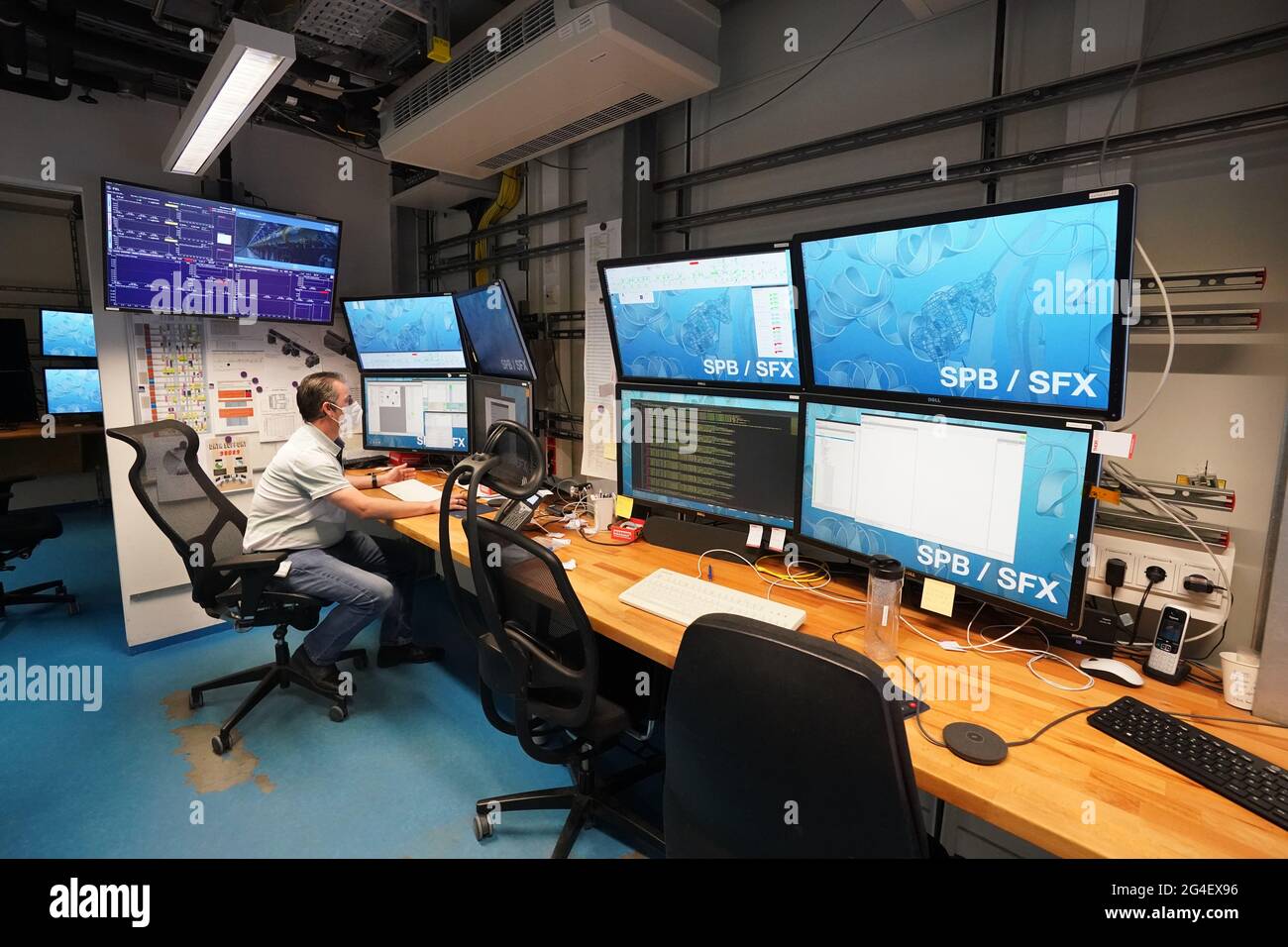 Schenefeld, Germany. 21st June, 2021. Scientist Adam Ground sits in the ...