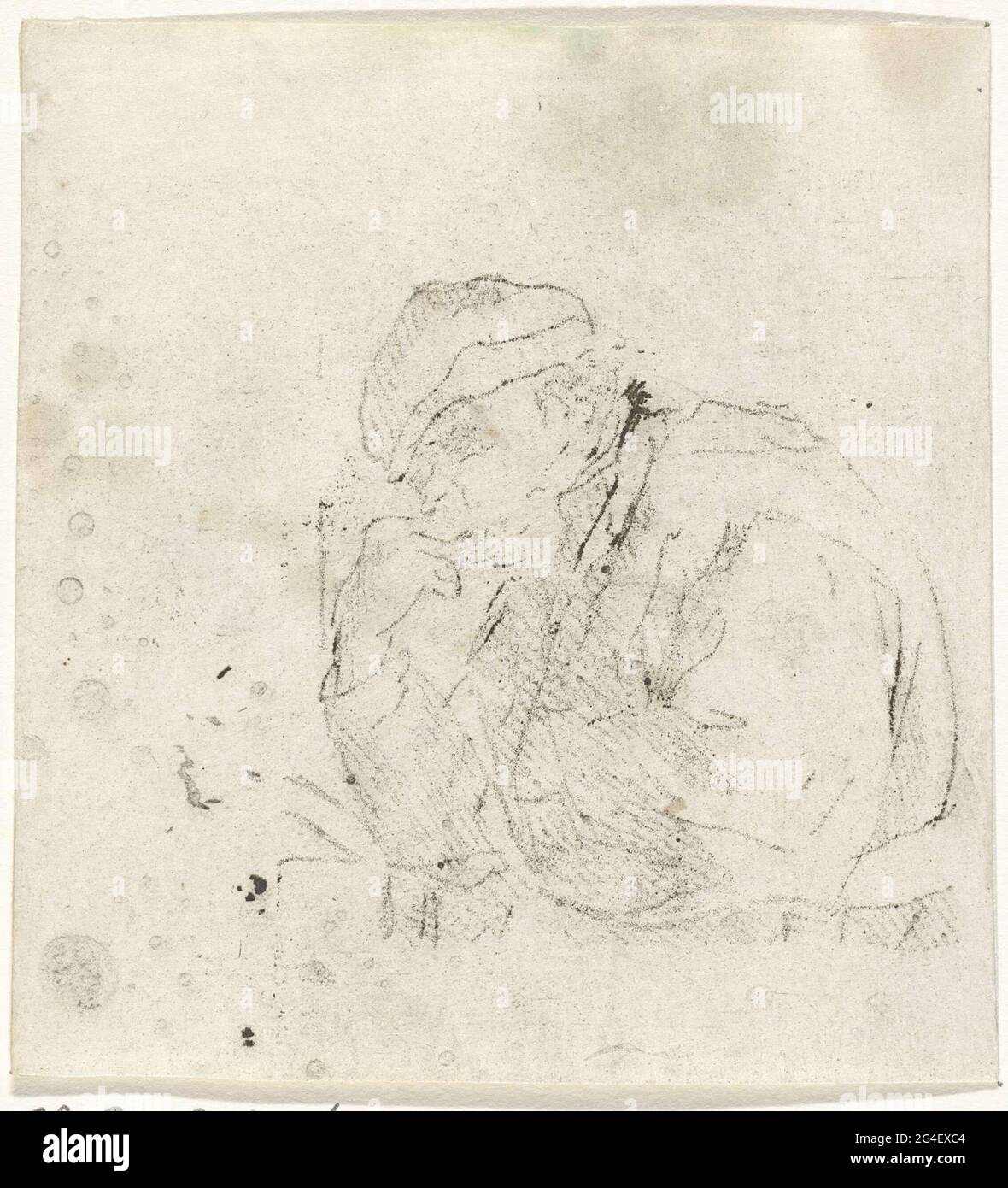 . A man with a hand his head supporting Stock Photo - Alamy