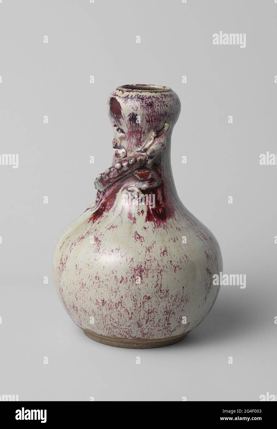 Pear-shaped vase with a molded tarragon. Pear-shaped vase of stoneware ...