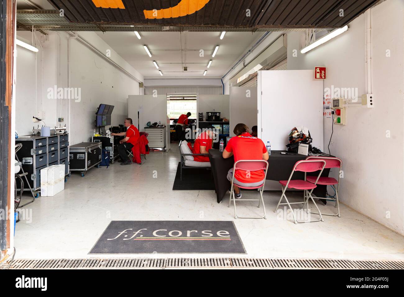 A team of Ferrari in the boxes area during the Passione Ferrari of the ...