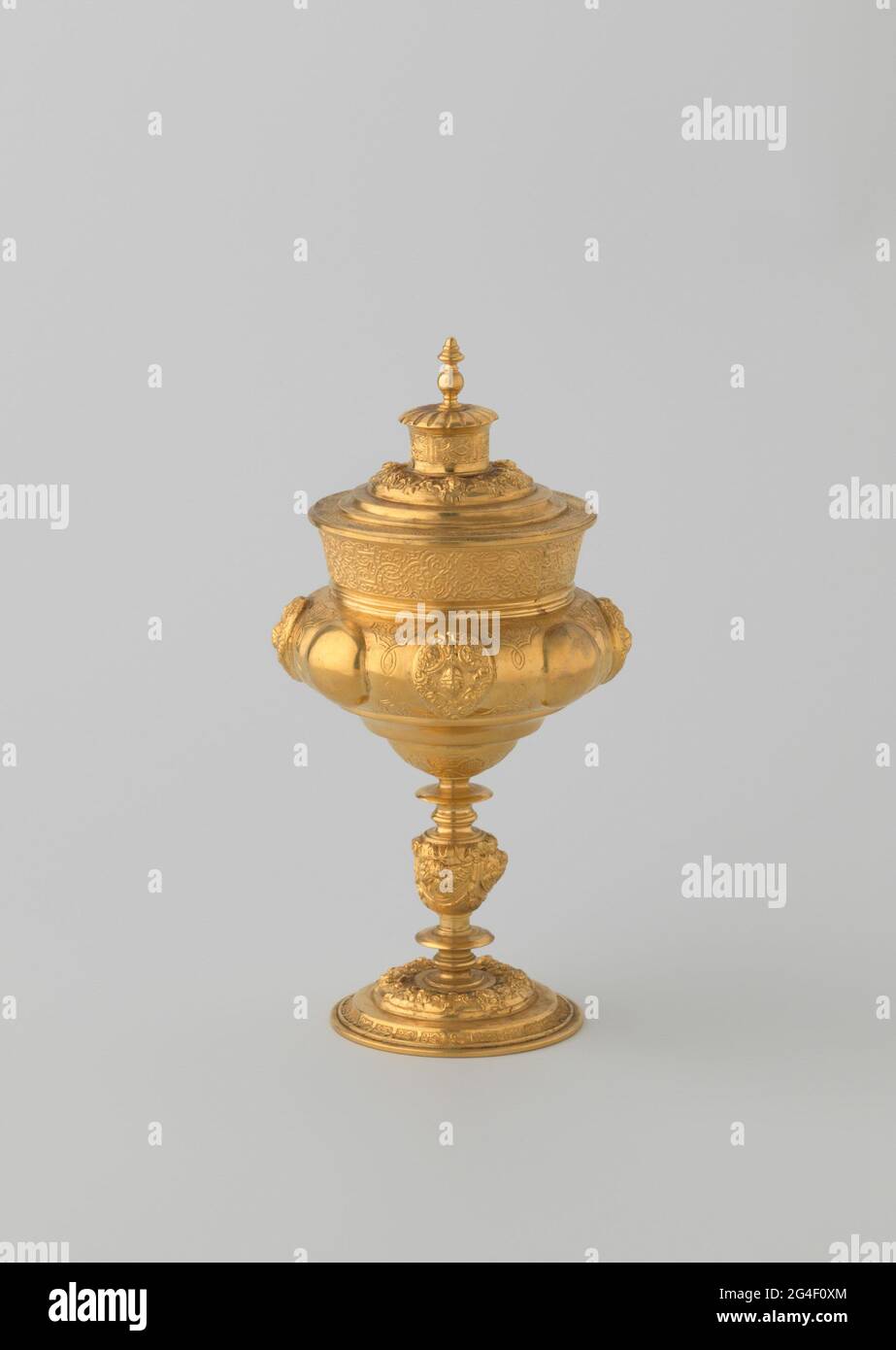 Galvanoplastic reproduction of a cup with lid decorated with masks ...