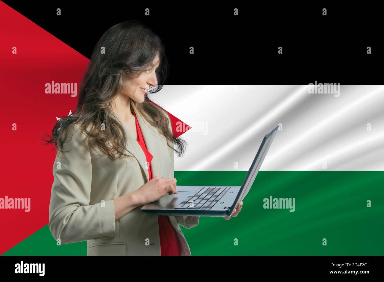 Freelance in Jordan Beautiful young woman freelancer uses laptop ...