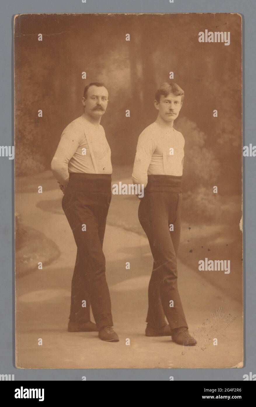 Studio portrait of two unknown men (presumably) in sportswear Stock ...