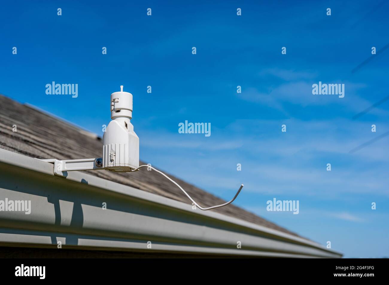Wireless sprinkler rain sensor used to conserve water. Device is ...