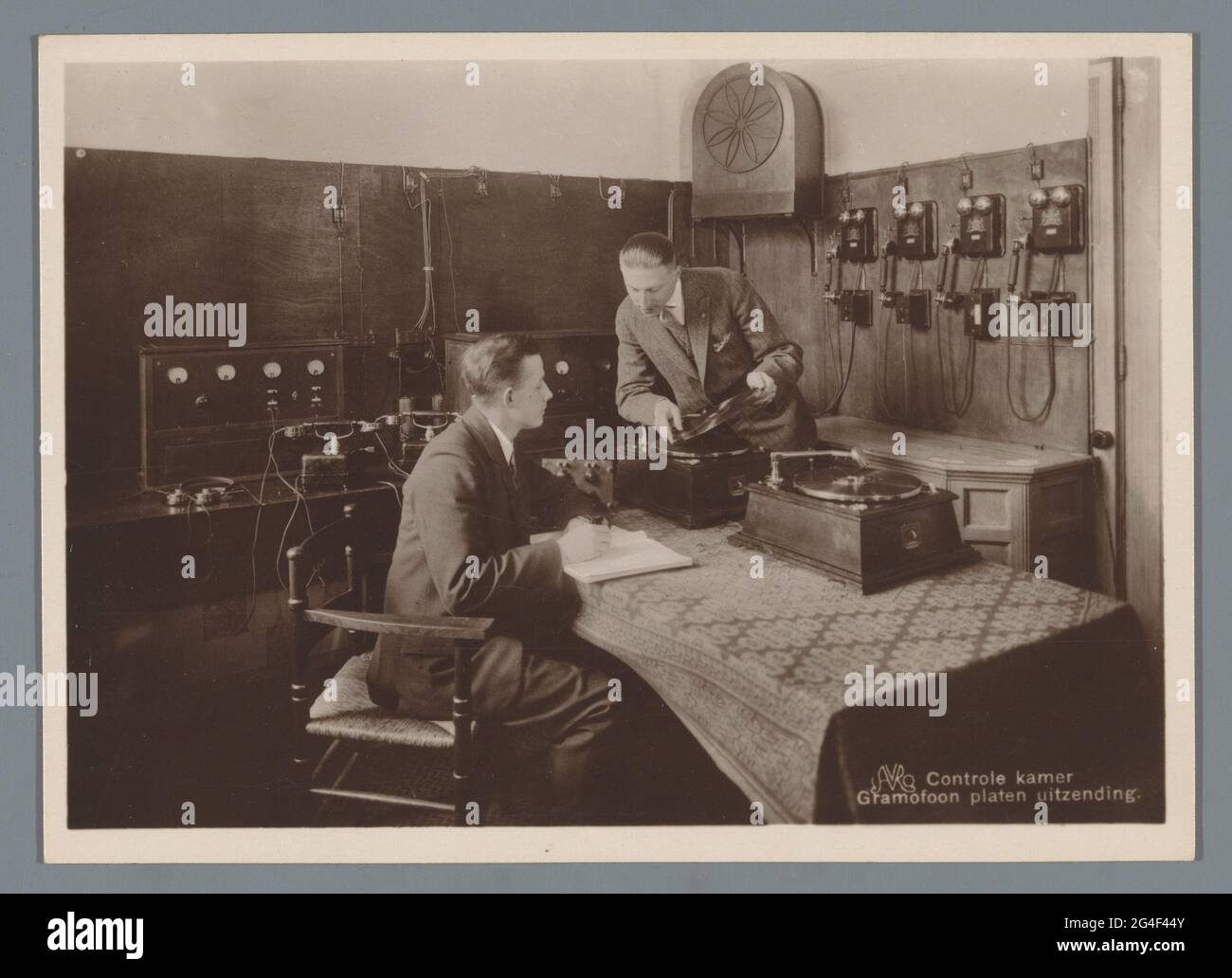 Portrait in control room during gramophone recording broadcast; A.V.R.O ...