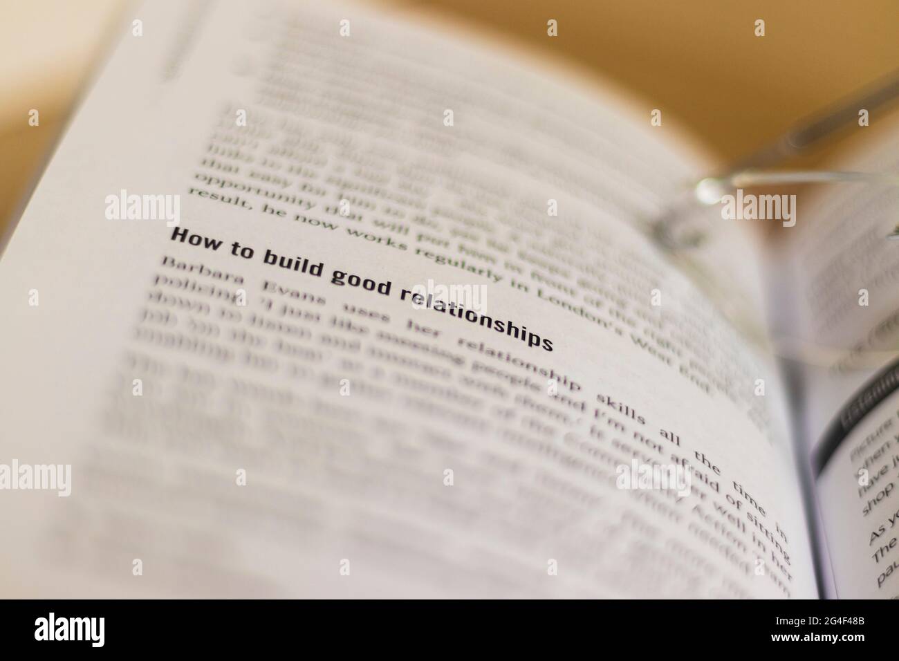 Open book with quote how to build good relationships Stock Photo - Alamy