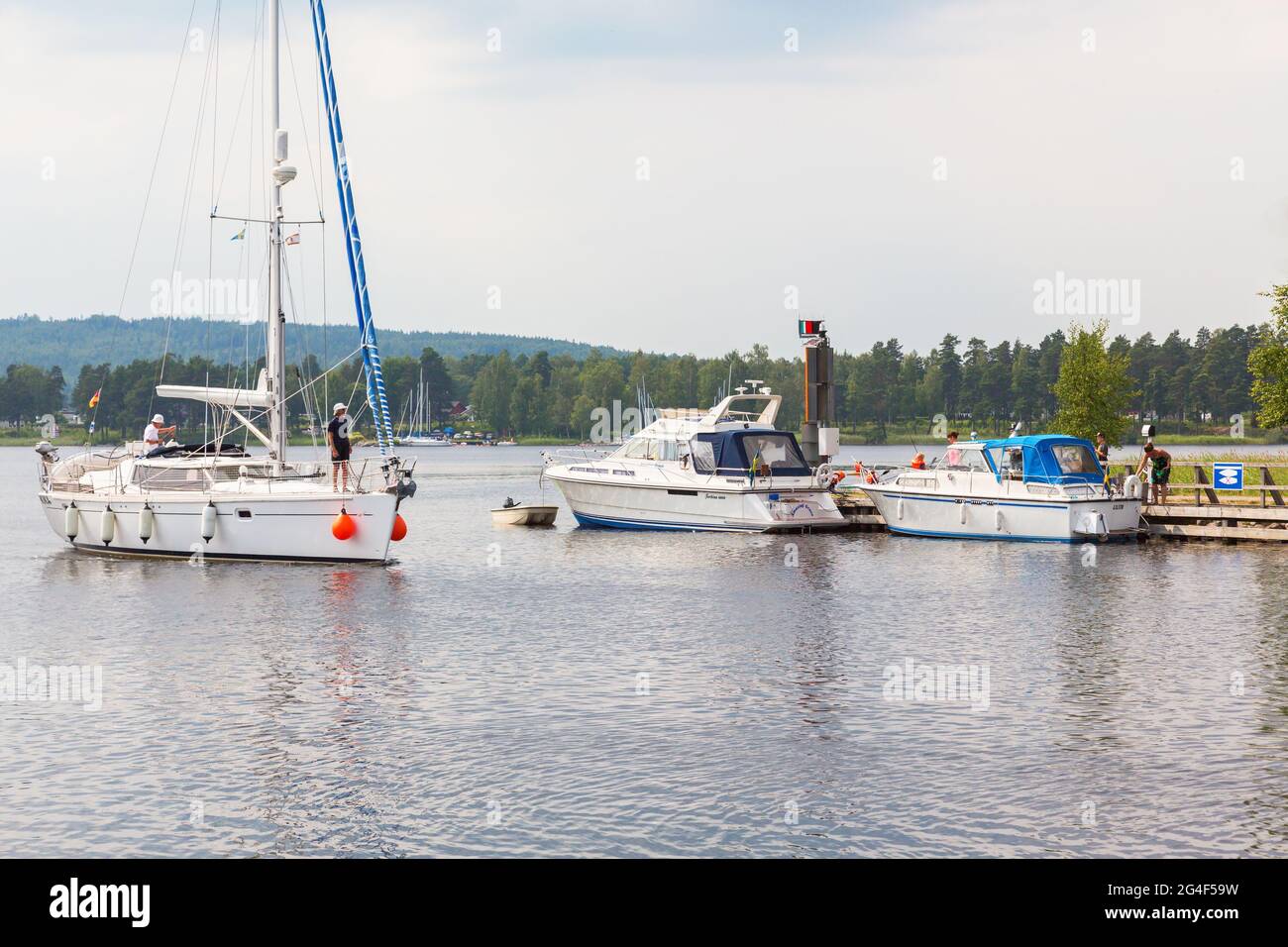 Sailboat heading toward the bridge Stock Photo - Alamy