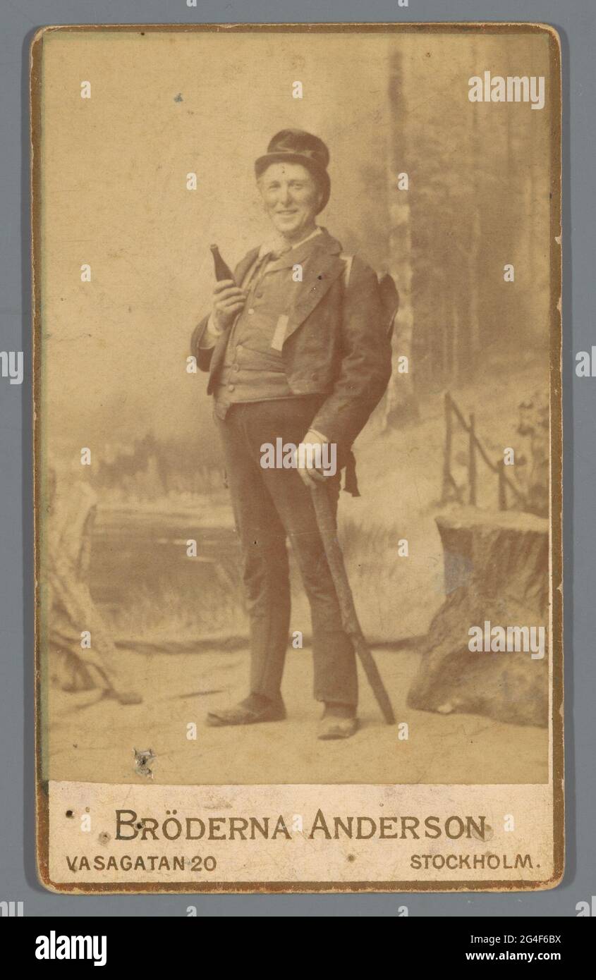 Portrait man dressed as a tramp Stock Photo - Alamy