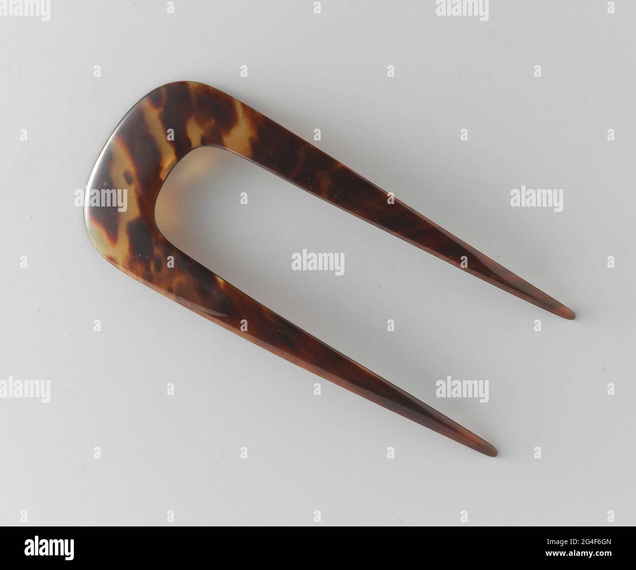 . Hair comb of turtle, U-shaped with rounded back Stock Photo - Alamy