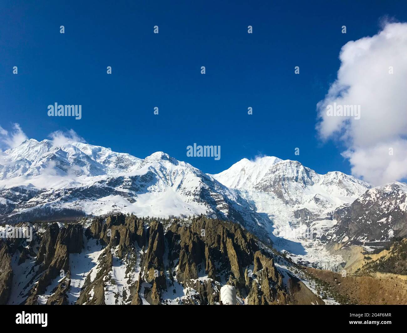 Snow covered mountains and beautiful sky at Nepal Stock Photo - Alamy