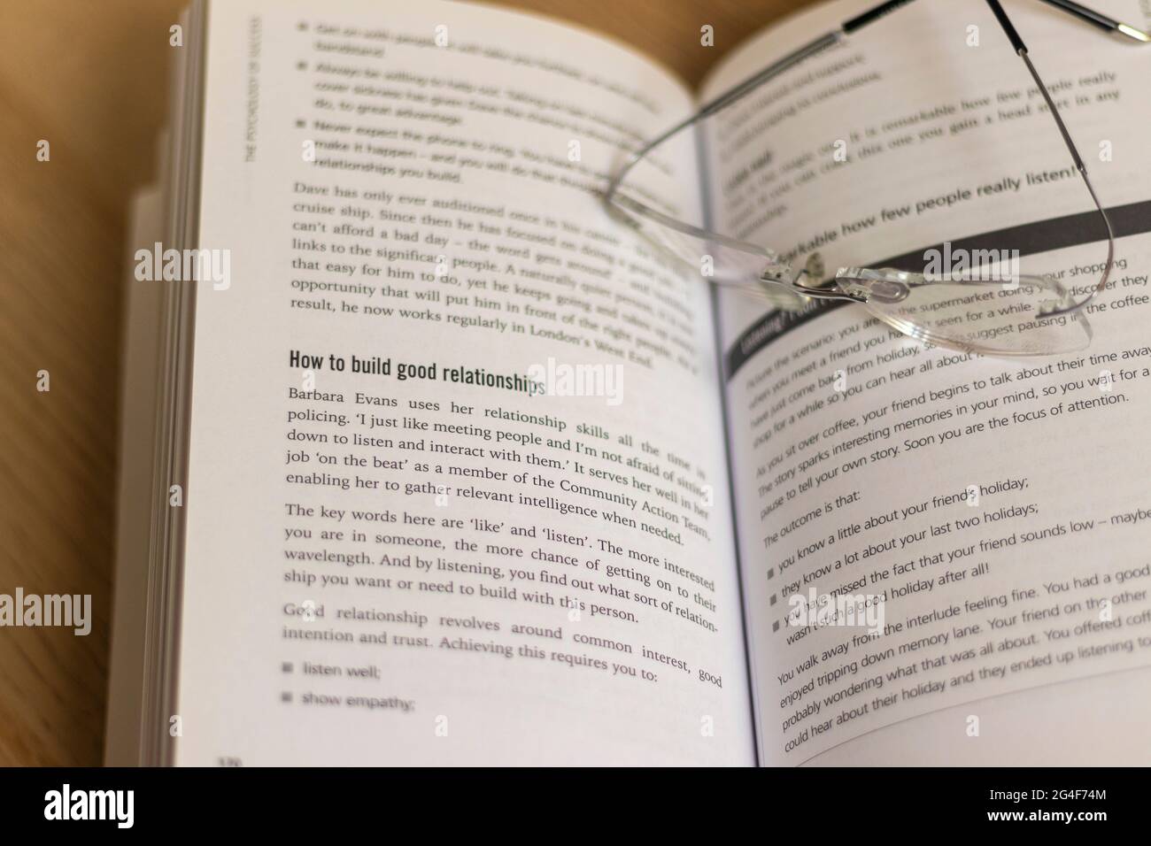 Open book with quote how to build good relationships Stock Photo - Alamy