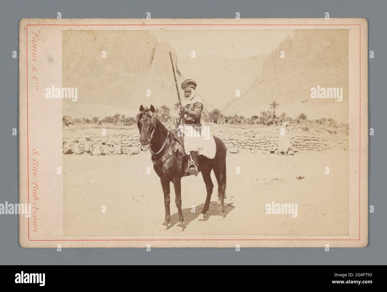 Arabian man on horseback with a lance Stock Photo - Alamy