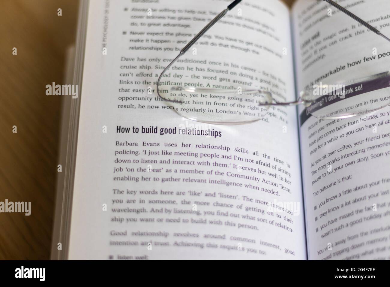 Open book with quote how to build good relationships Stock Photo - Alamy