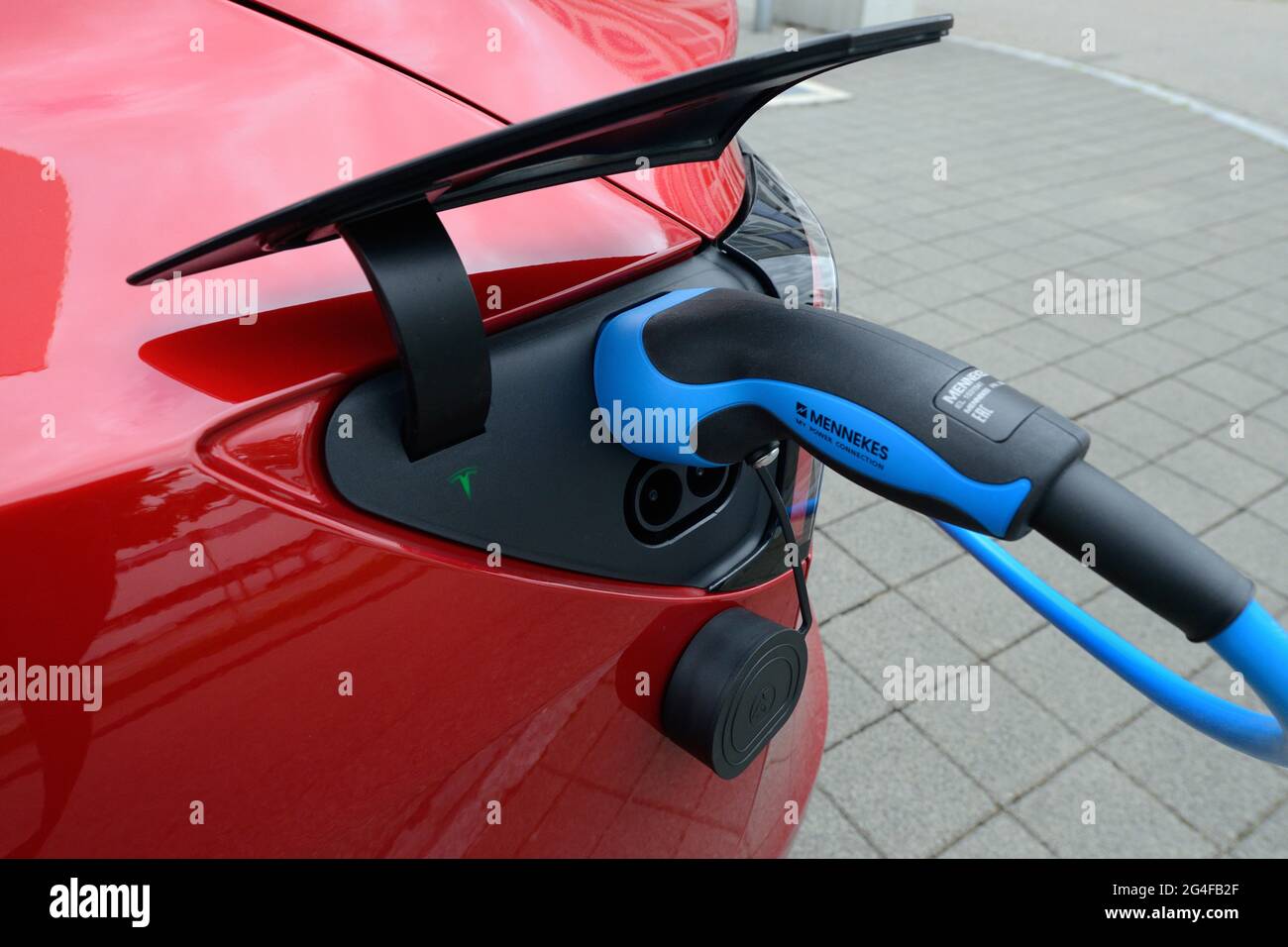 Charging port with charging cable on car Tesla Model 3, Germany Stock ...