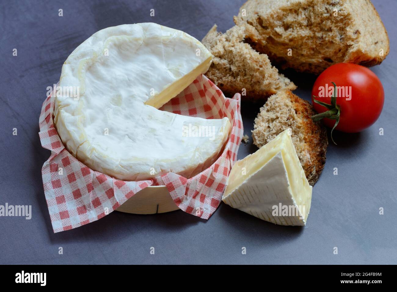 French Camembert, sliced soft cheese, Germany Stock Photo - Alamy