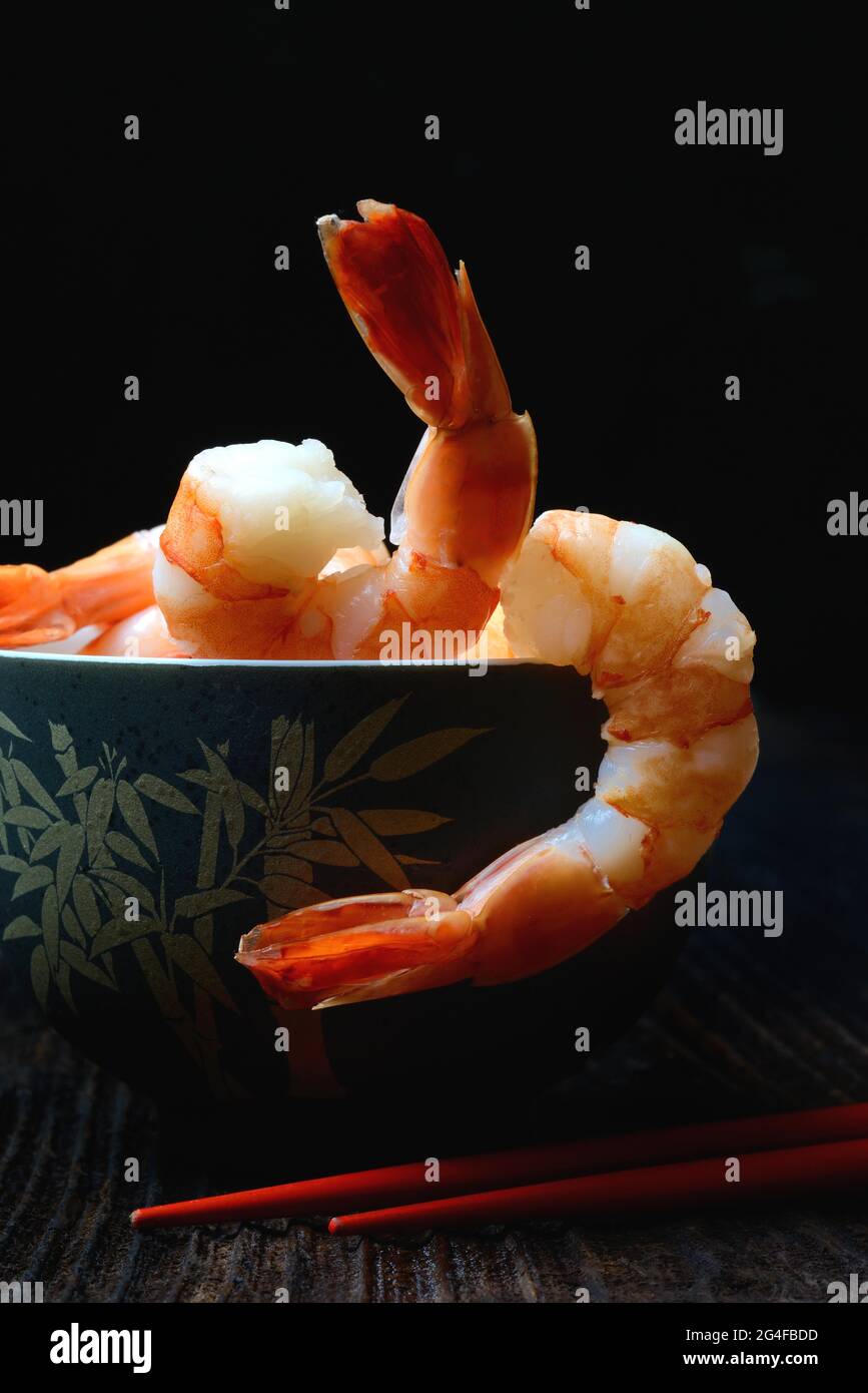 Cooked prawns in shell with chopsticks, Germany Stock Photo - Alamy