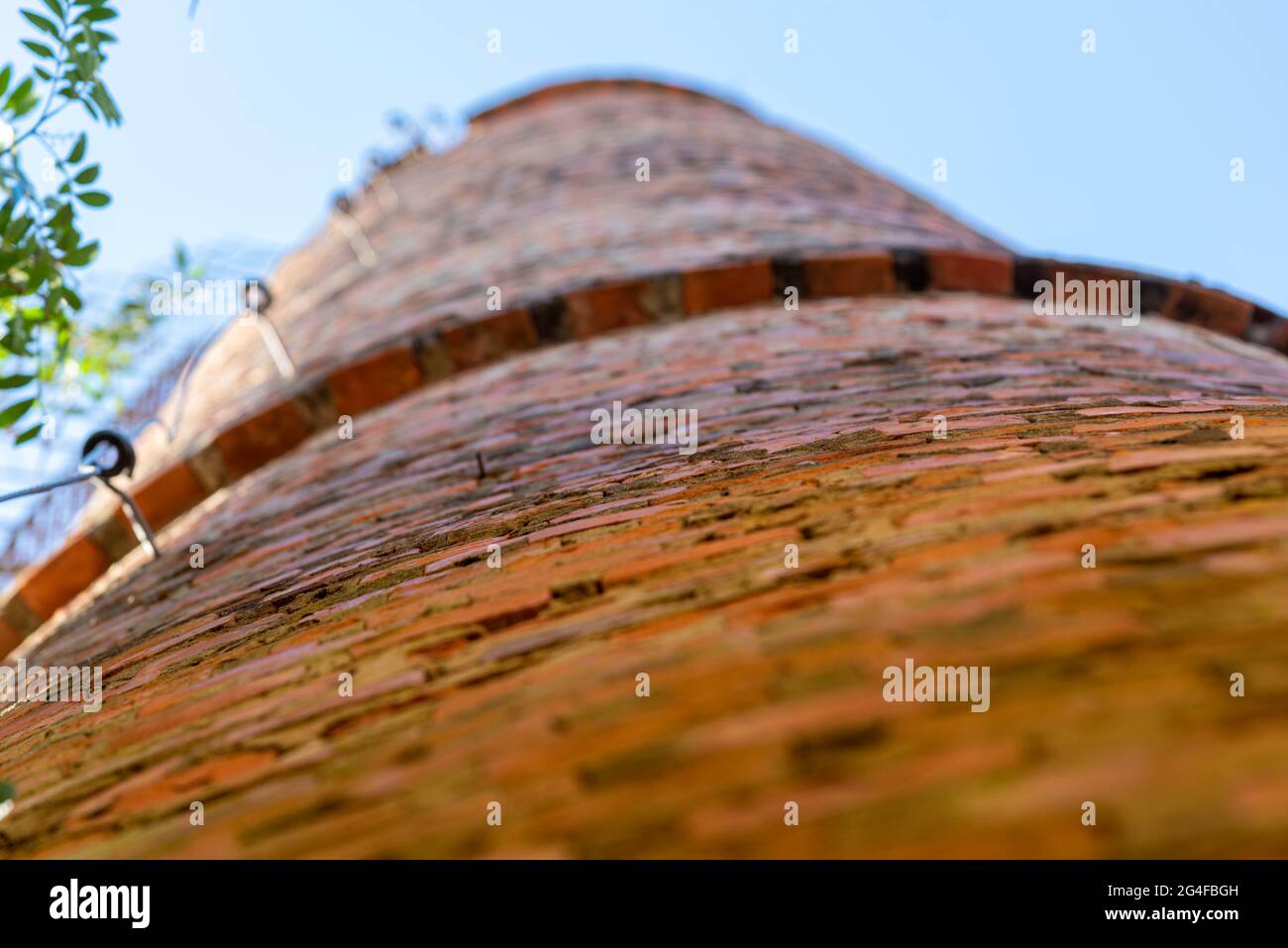 Brick tower of old abandoned factory. Ancient architecture. Abandoned ...