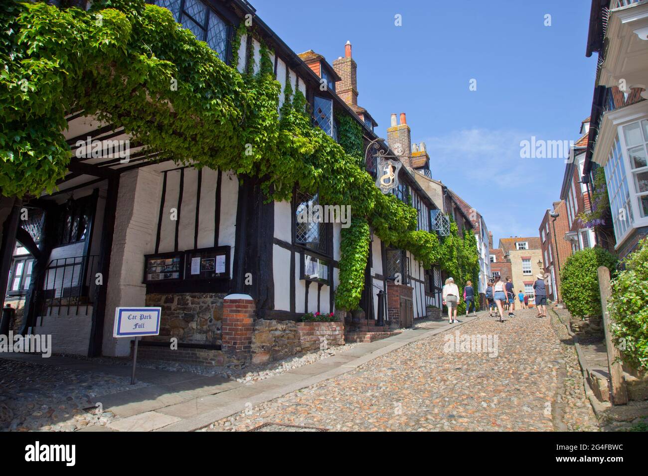 The cobbled Mermaid st at Rye in Kent, England, with the Mermaid Inn ...
