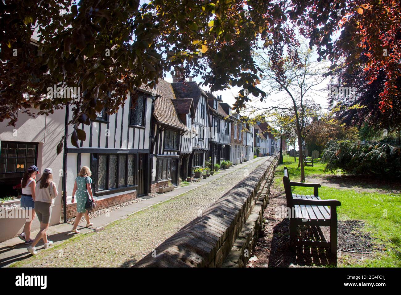 Tourists walk along Church Square in Rye, Kent, England. June 2021 ...
