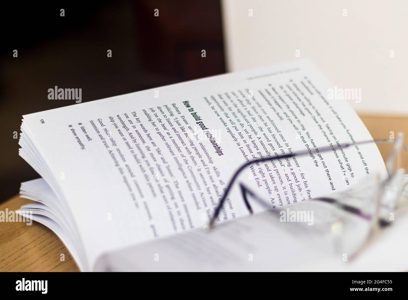 Open book with quote how to build good relationships Stock Photo - Alamy