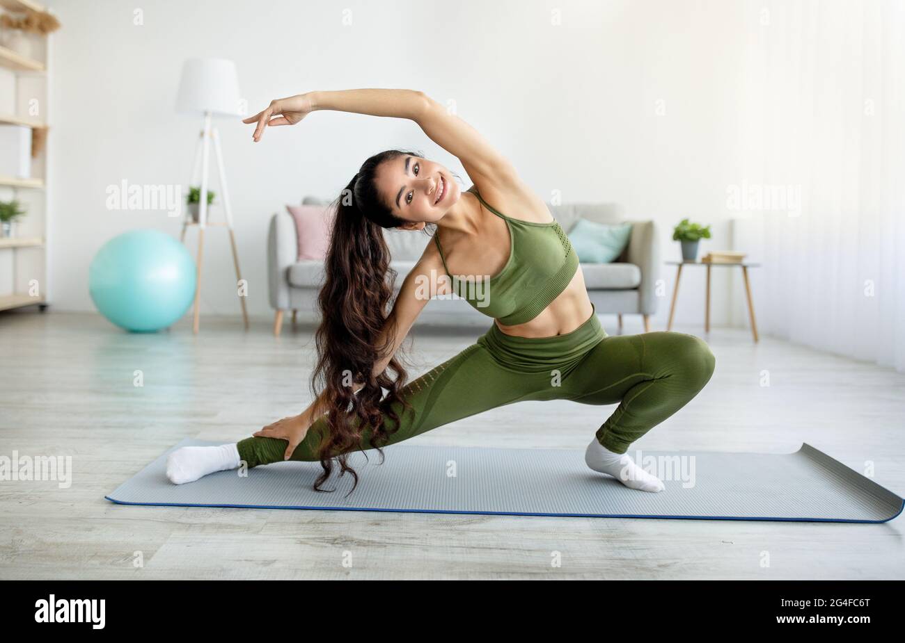 Indian lady yoga stretching hi-res stock photography and images - Alamy