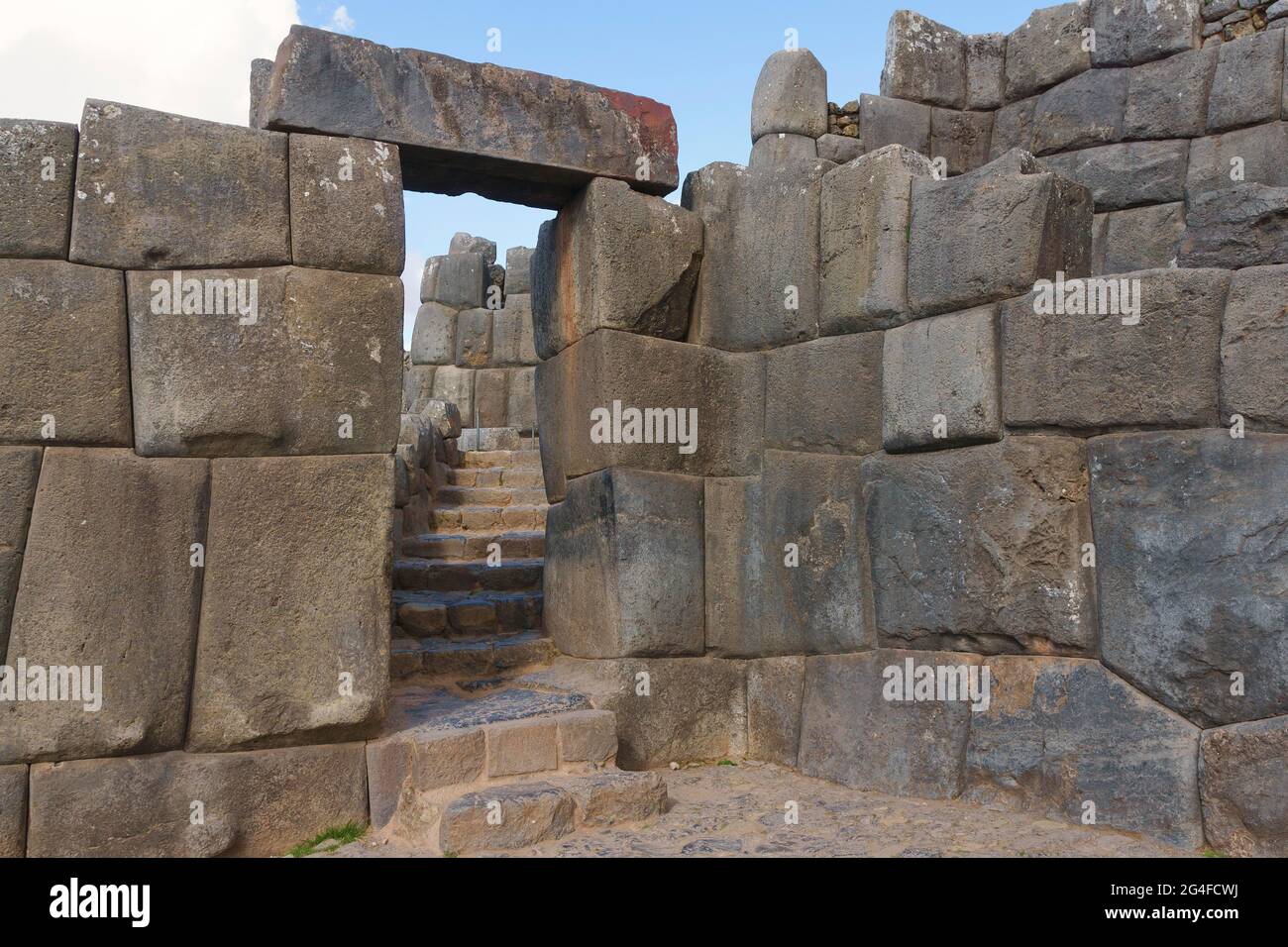 Stone gate in the fortress wall of the Inca ruins Sacsayhuaman, Cusco ...